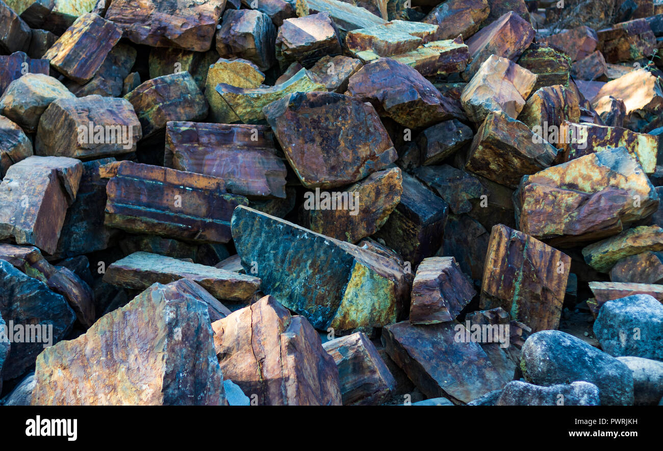 Iron ore mineral rich cut ornamental stone with cracks Stock Photo - Alamy
