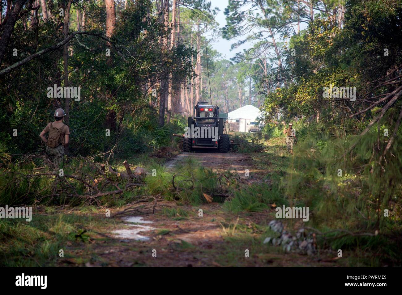 Seabees assigned to Naval Mobile Construction Battalion (NMCB) 11 work ...