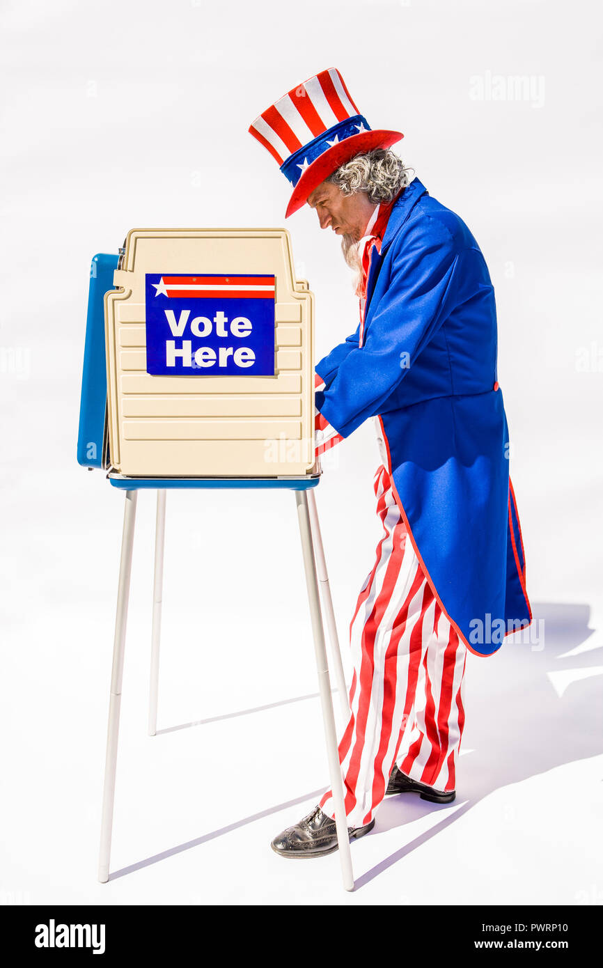 Uncle Sam at a voting booth on white background Stock Photo - Alamy