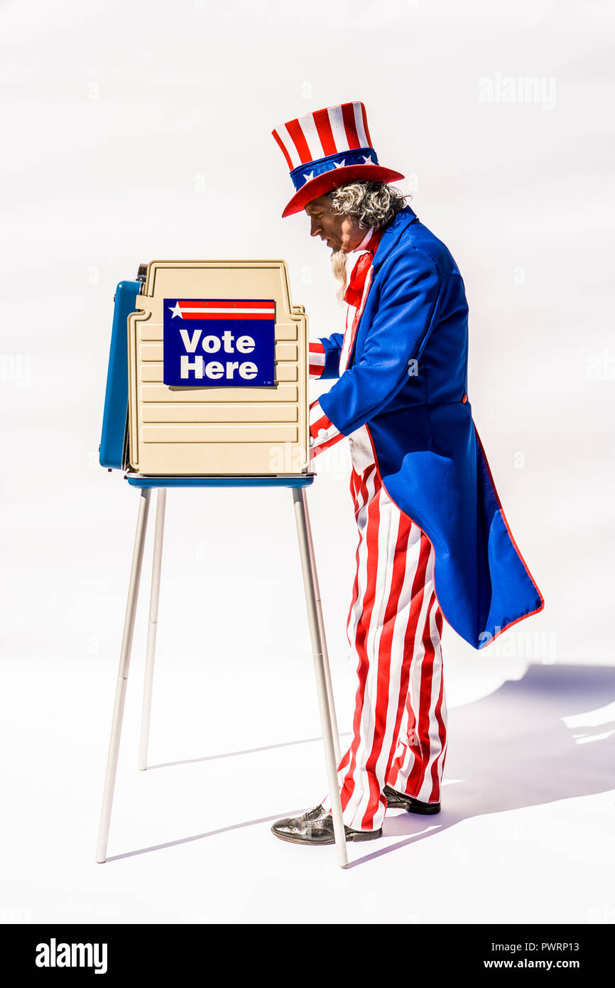 Uncle Sam at a voting booth on white background Stock Photo - Alamy
