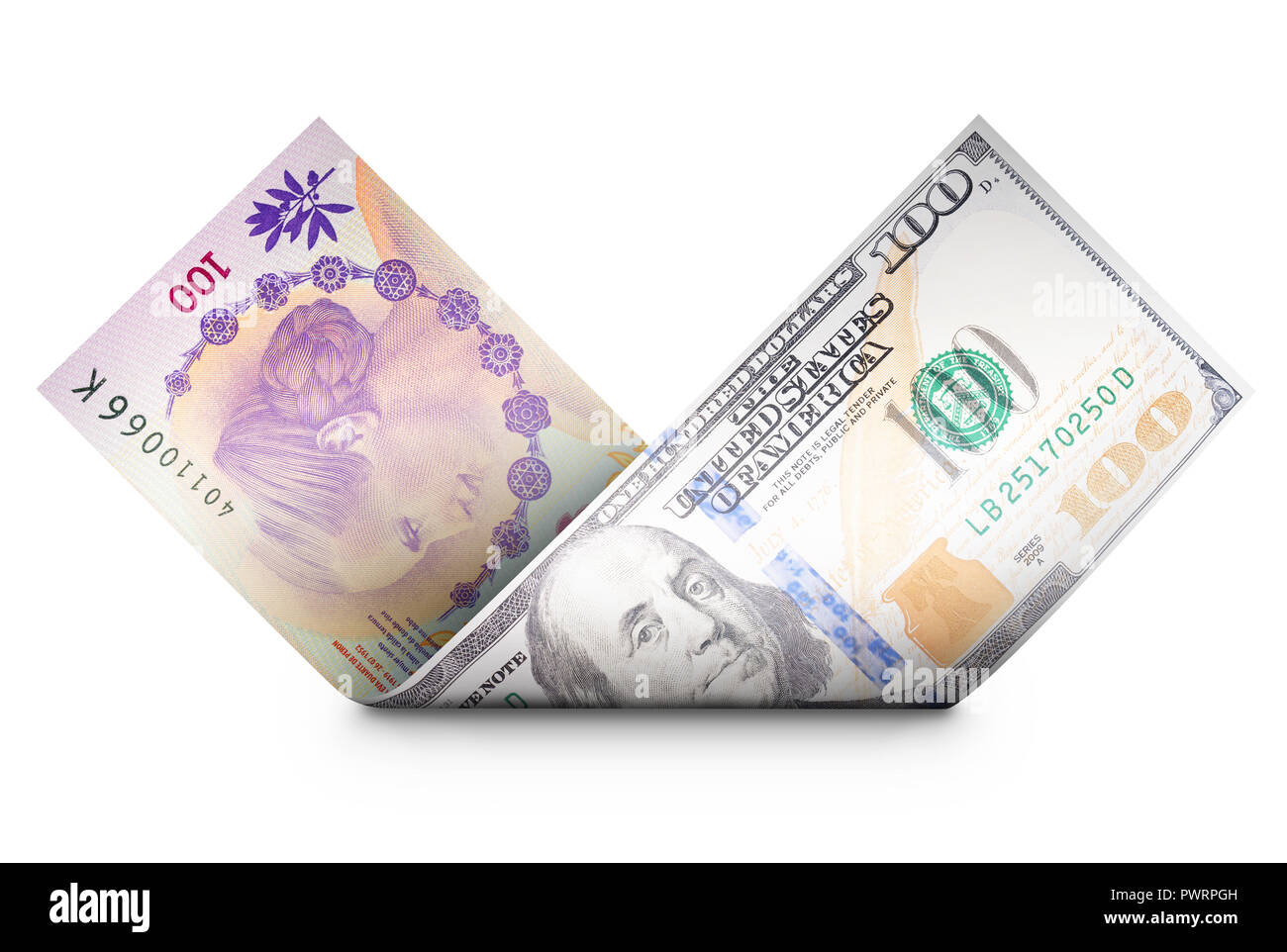 Two money bills aligned on top of each other and bended so that it ...