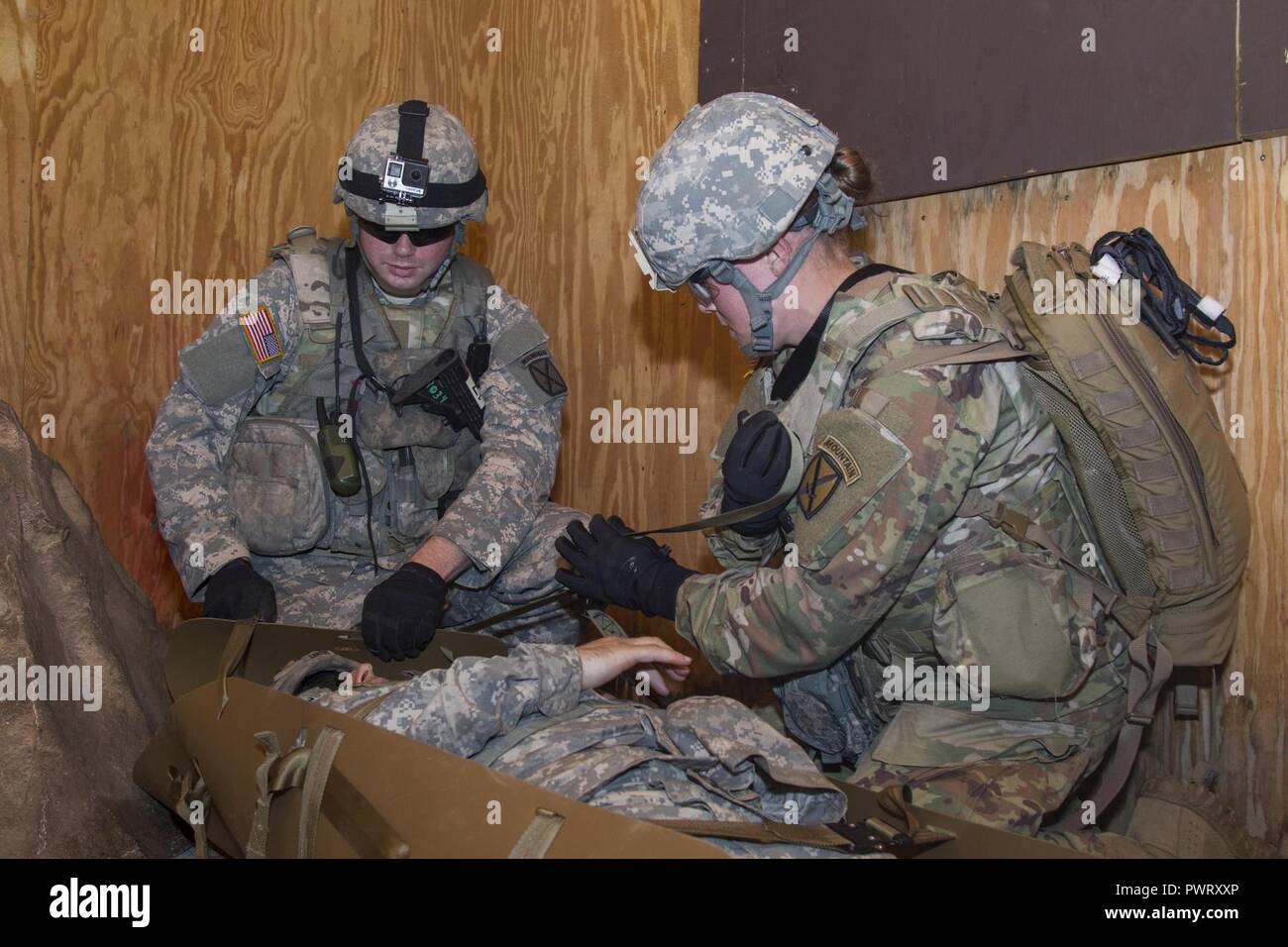 U.S. Army Sgt. Riley Worth, left, and Sgt. Kayla Towle, right, medics ...