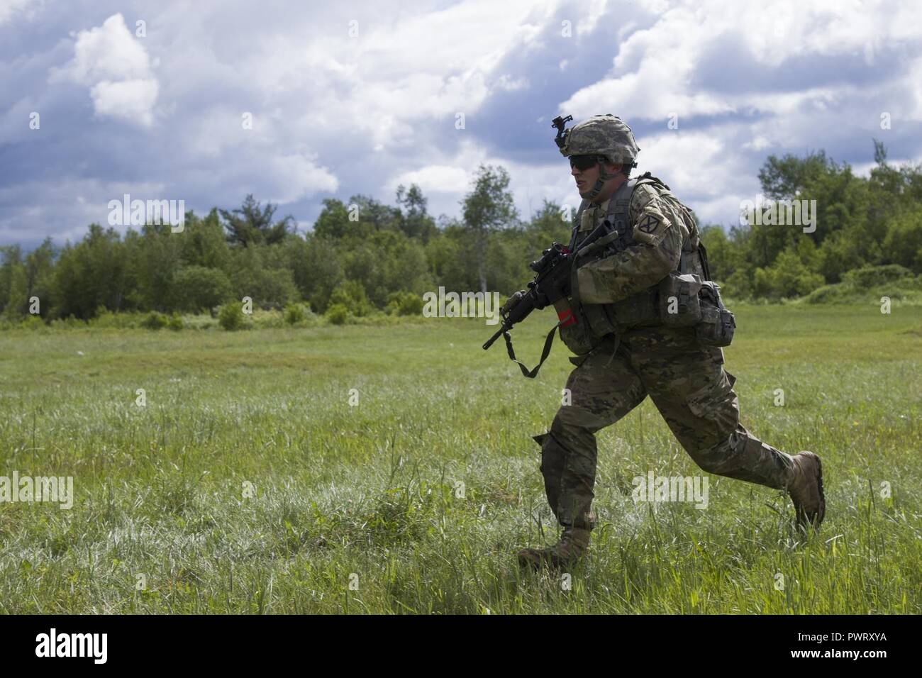 A U.S. Soldier with Charlie Troop, 1st Squadron, 172nd Cavalry Regiment ...