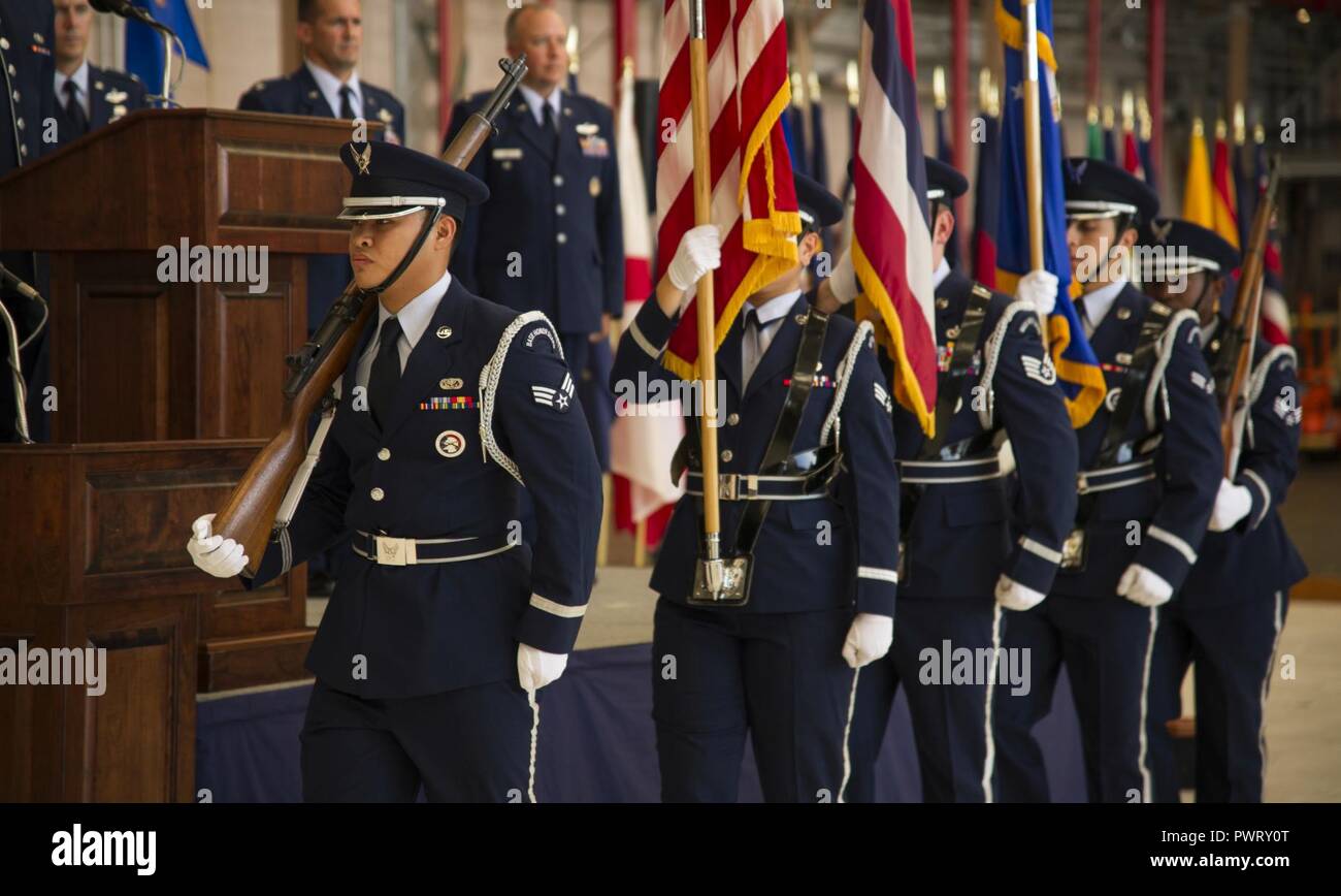 Members of the Honor Guard post the colors for the National Anthem and ...