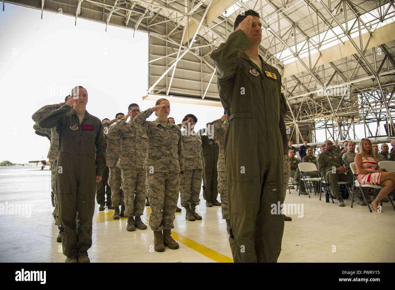 The men and women of the 15th Operations Group give their first salute ...