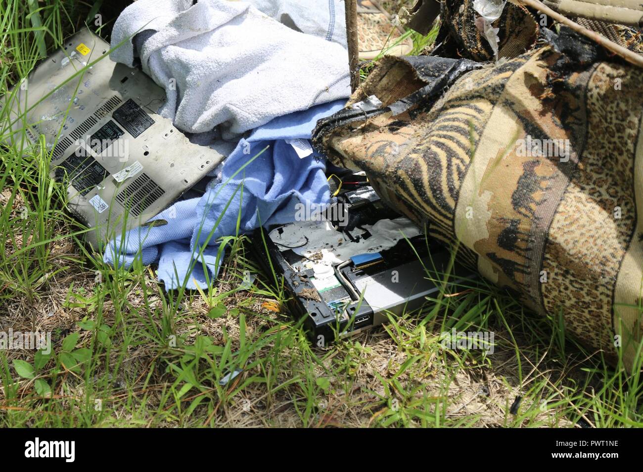 A suitcase and its contents, following a Hydro jet device explosion ...