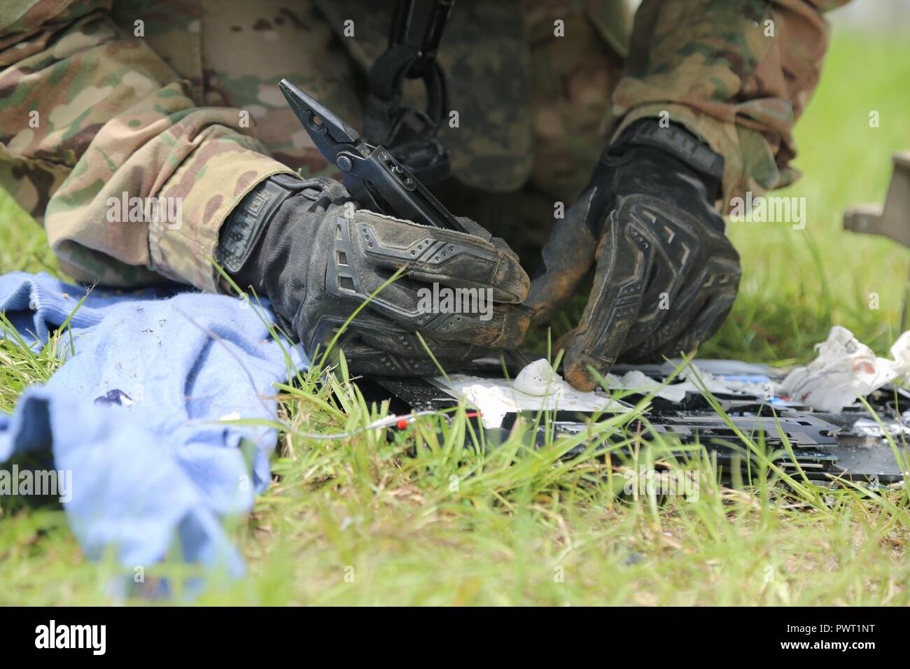 U.S. Army Staff Sgt. Steven Neal, assigned to 705th EOD Company, 63rd ...