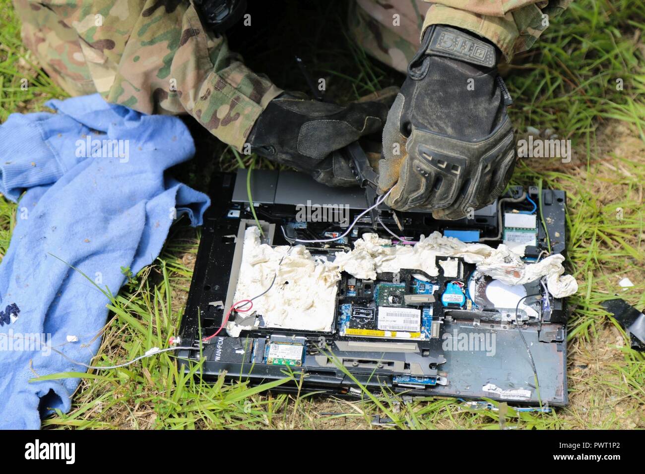 U.S. Army Staff Sgt. Steven Neal, assigned to 705th EOD Company, 63rd ...