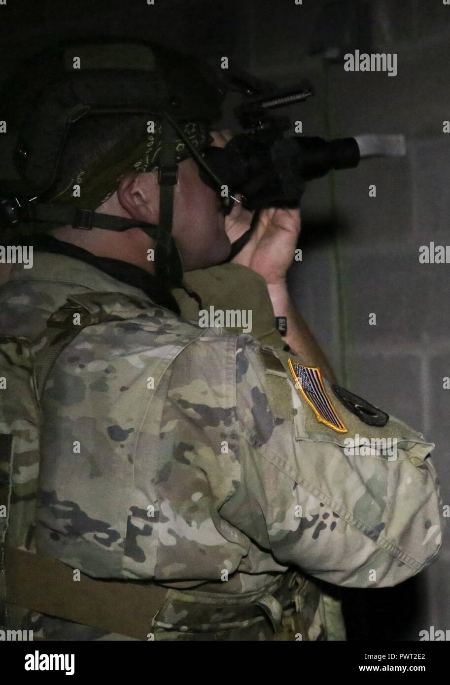 A U.S. Army Soldier, assigned to the 752nd Ordnance Company, adjusts ...