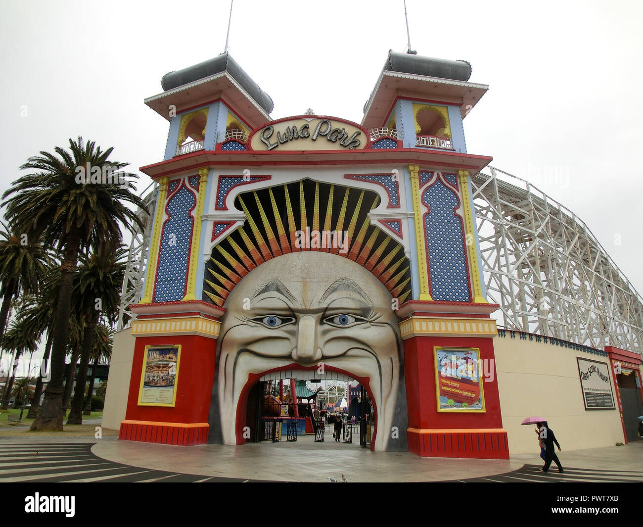 Melbourne Luna Park amusement park entrance with people Stock Photo - Alamy