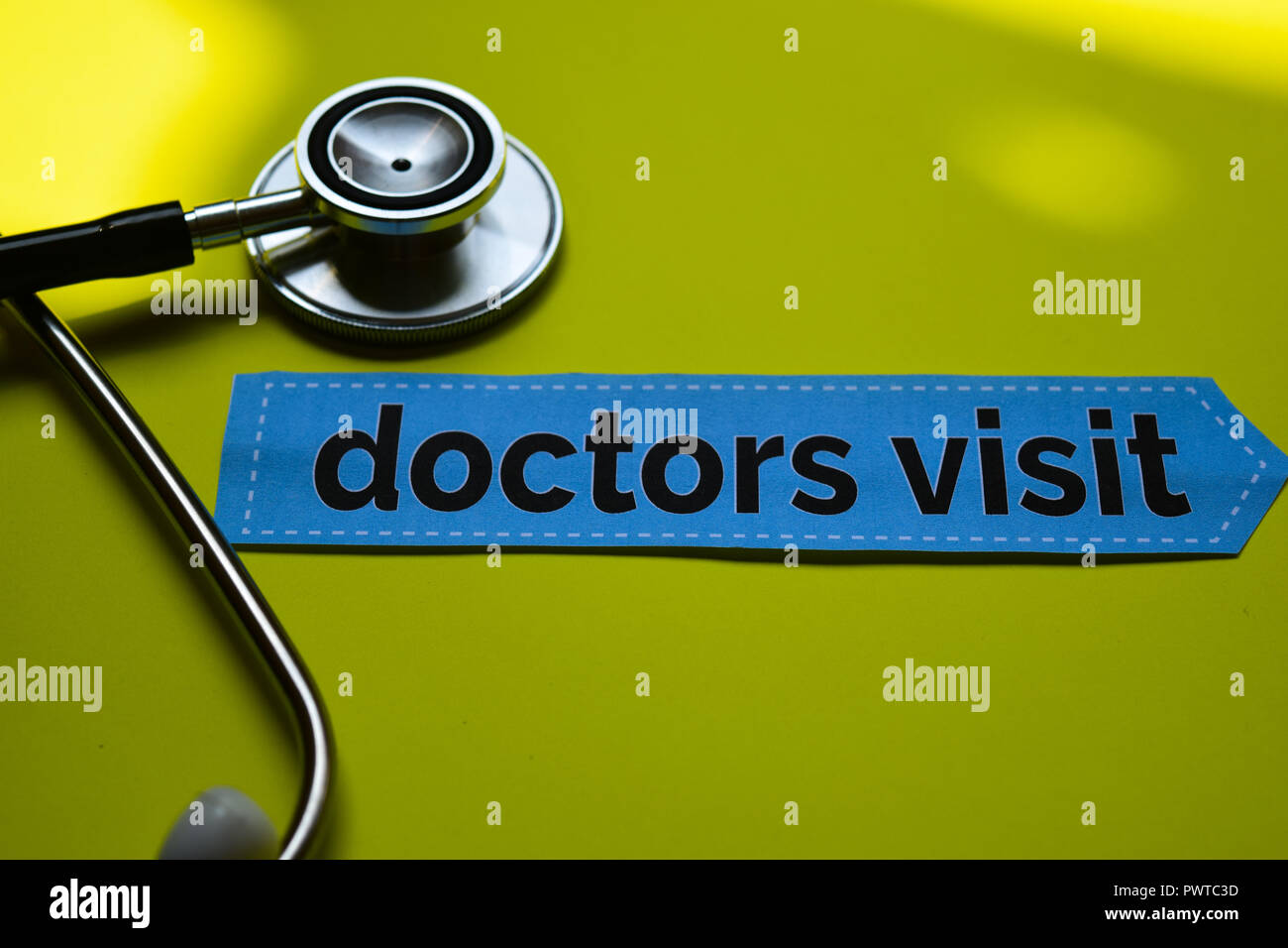 doctor visit with stethoscope concept inspiration on yellow background ...