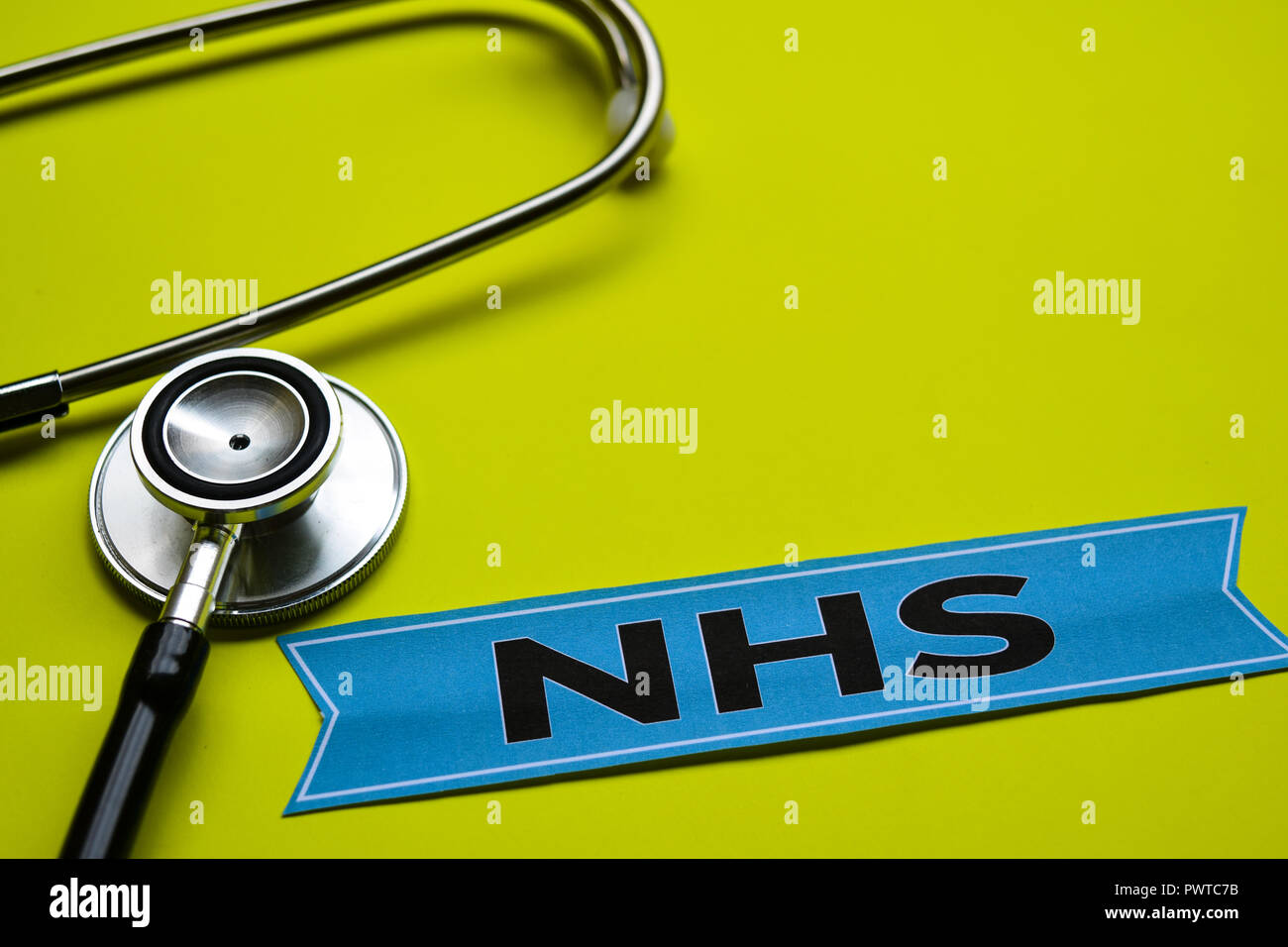 NHS with stethoscope concept inspiration on yellow background Stock ...