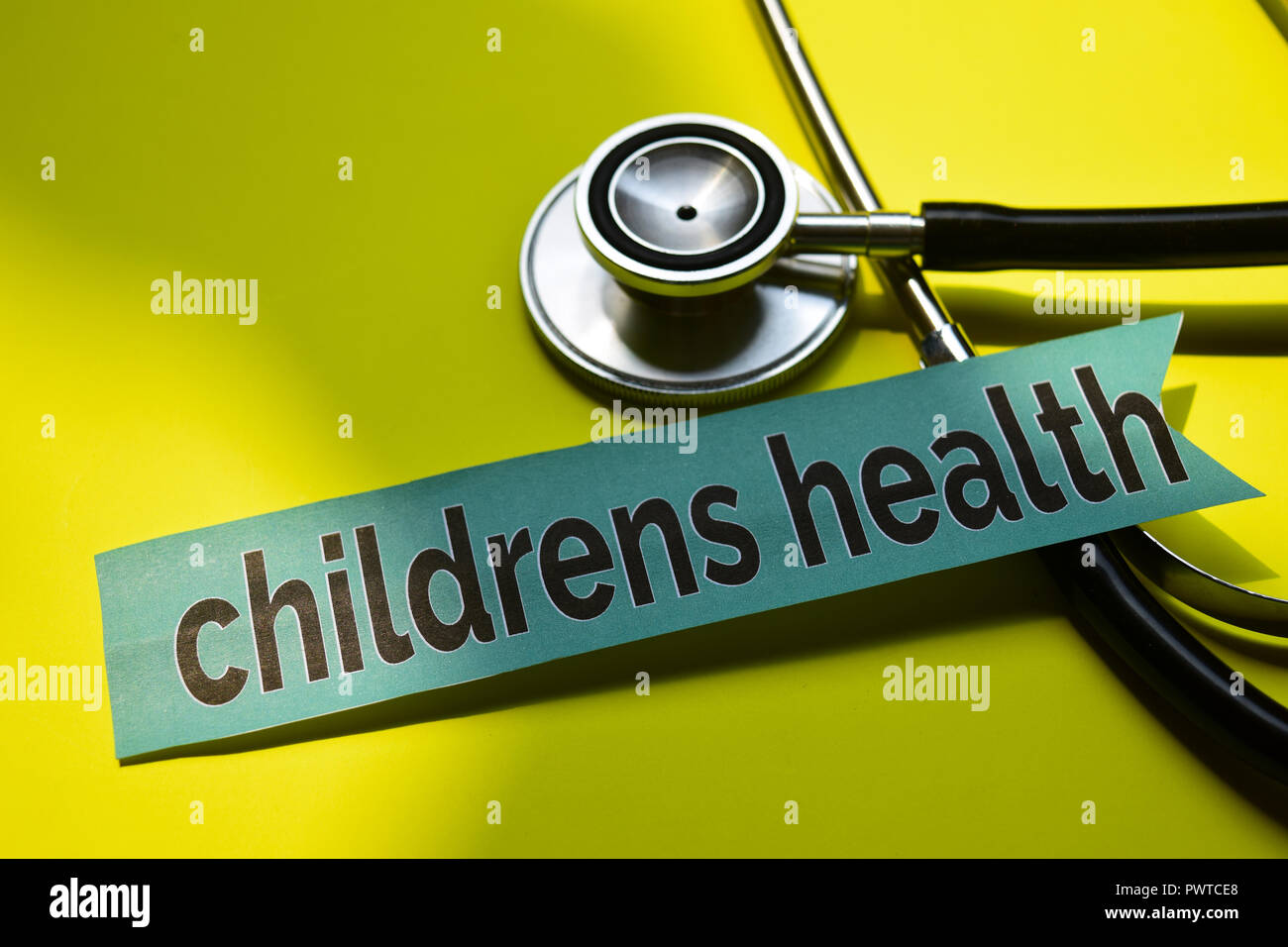 children health with stethoscope concept inspiration on yellow ...