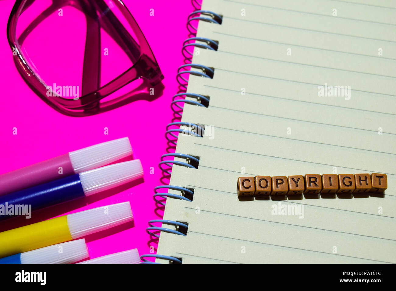 Copyright. Inspiration message written on wooden blocks. Cross ...