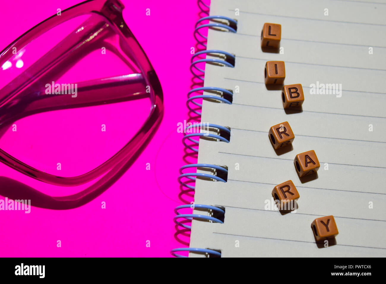 Library message written on wooden blocks. Education concepts. Cross ...