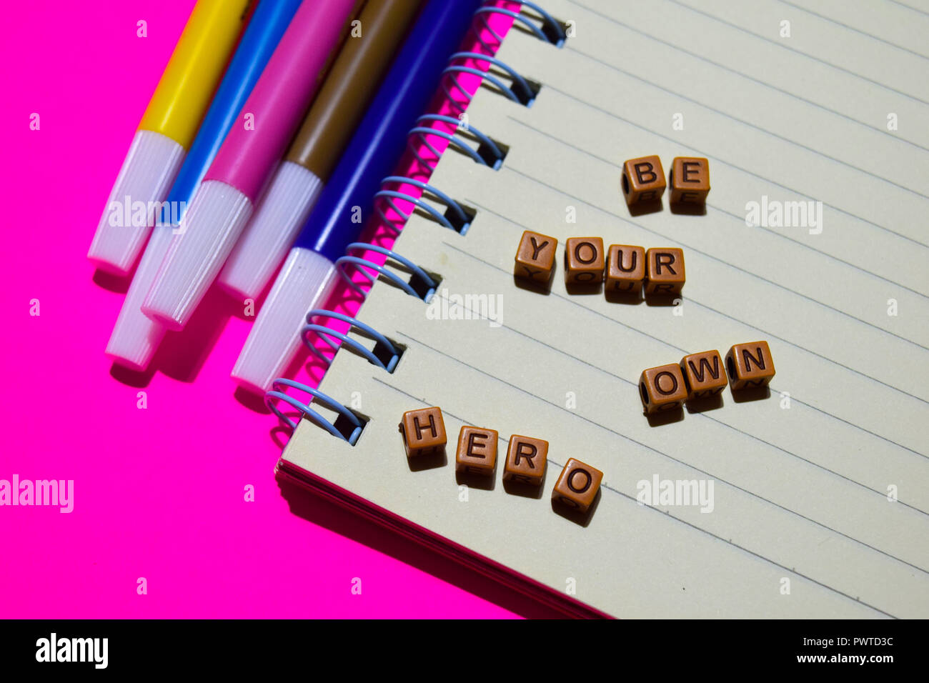 Be your own hero message written on wooden blocks. Motivation concepts ...