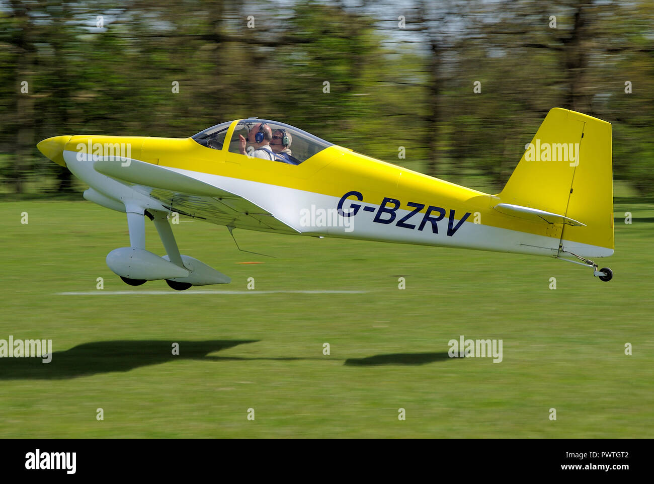 Vans RV-6 light plane G-BZRV taking off from Henham Park grass strip in ...