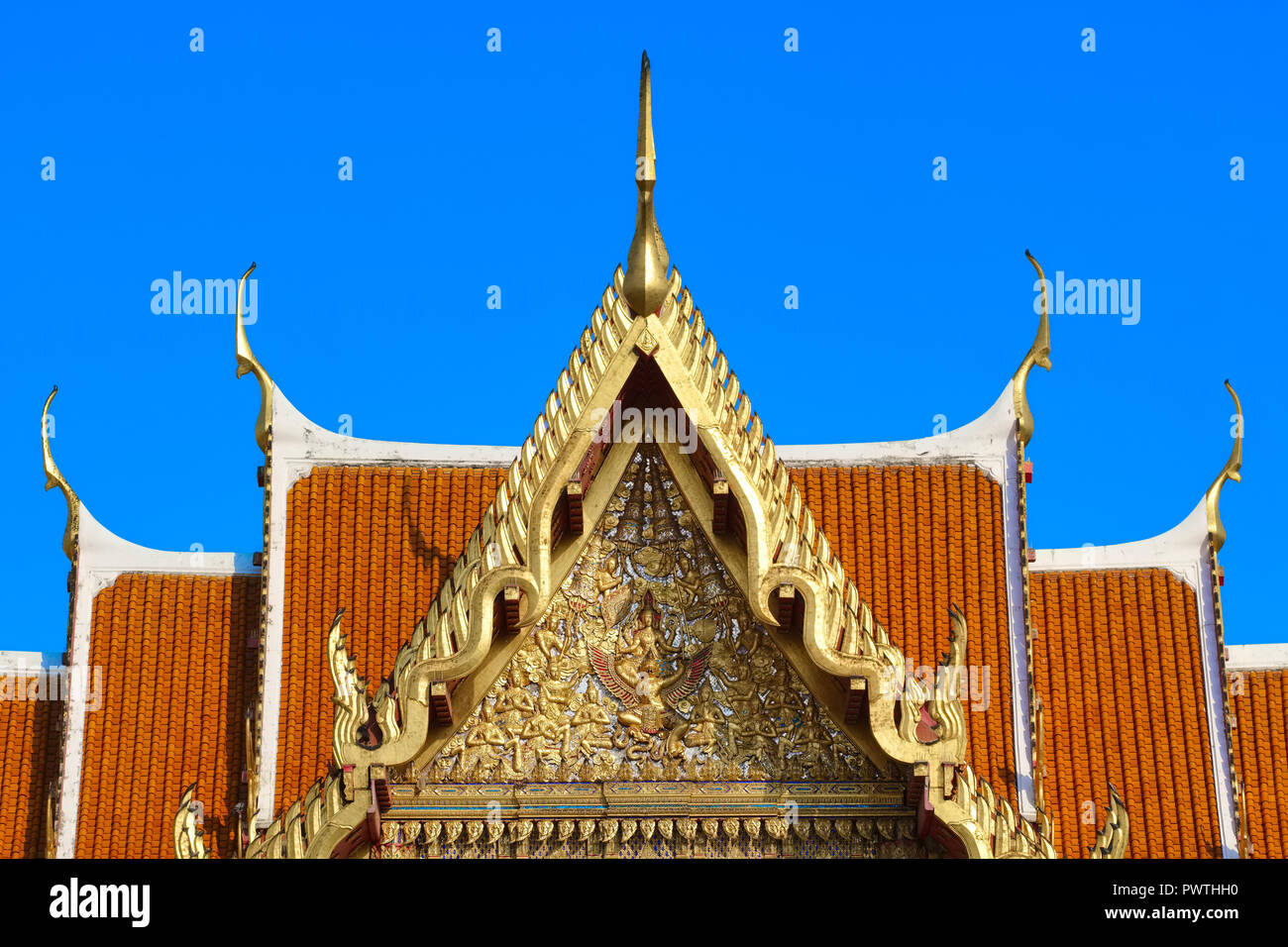 The multi-tiered roof of the Ubosoth or Bot (ordination hall) of Wat ...