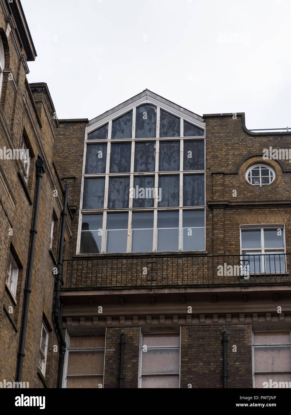 Distinctive windows in the former building of the Royal London Hospital ...