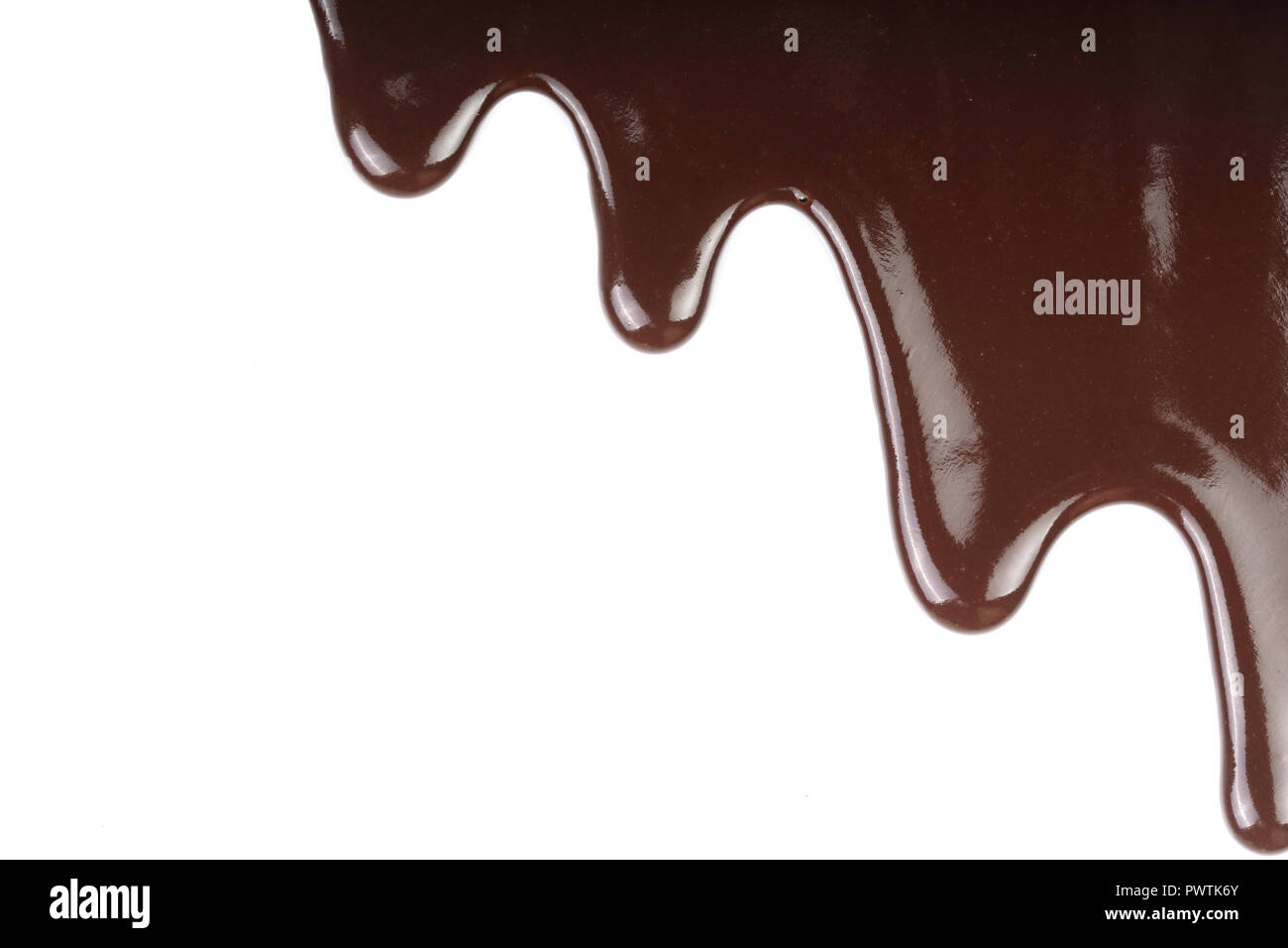 Melted chocolate dripping isolated on white background Stock Photo - Alamy