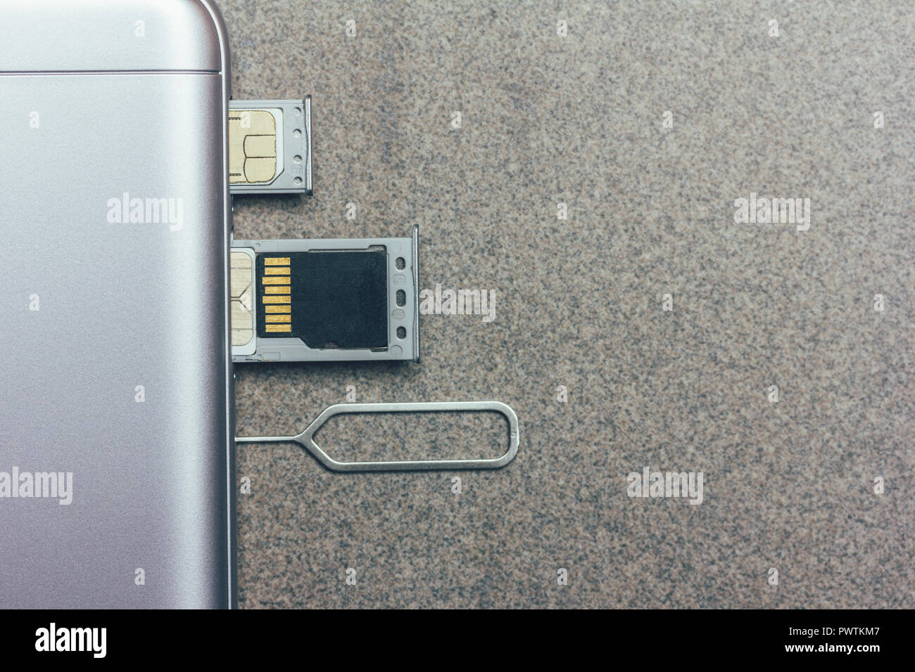 mobile phone and open slots for nano SIM cards, micro SD drive and ...