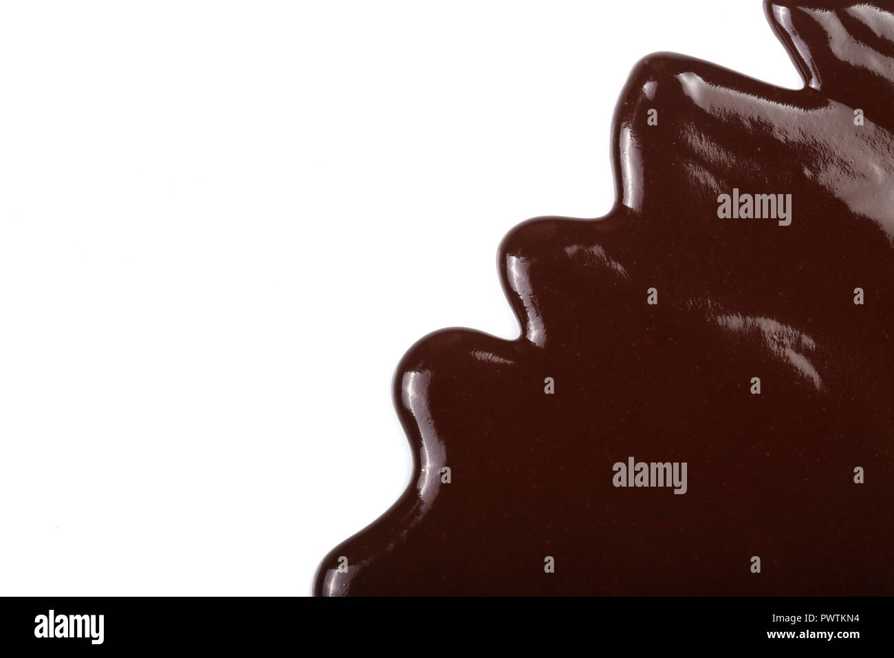 Melted chocolate dripping isolated on white background Stock Photo - Alamy