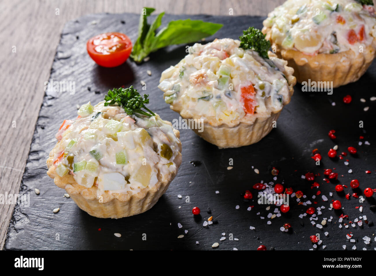 Russian salad canape with herbs Stock Photo - Alamy