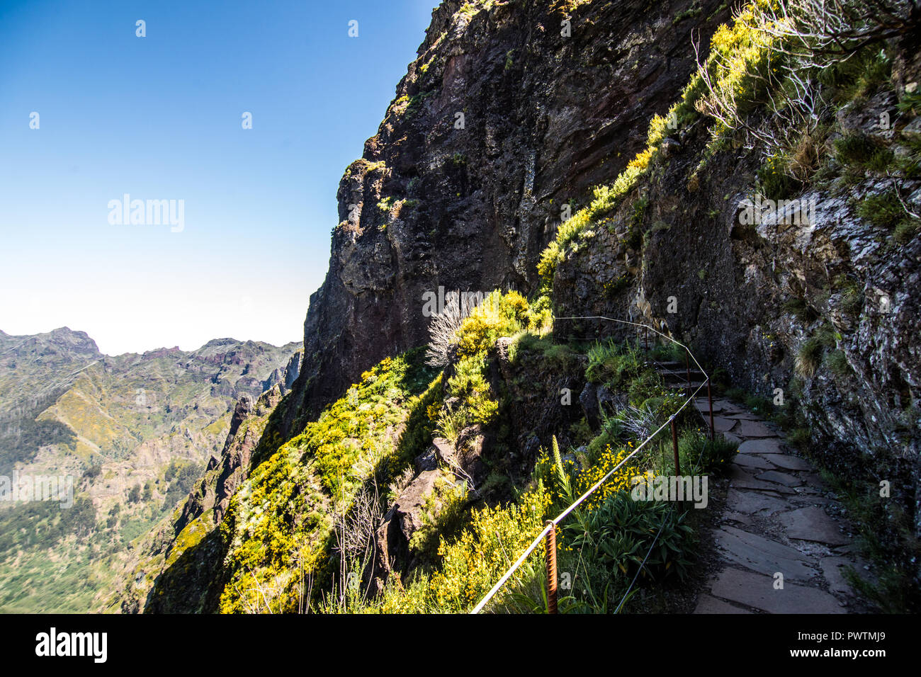 Colorful mountain ridge path with volcanic formations beside, Pico do ...