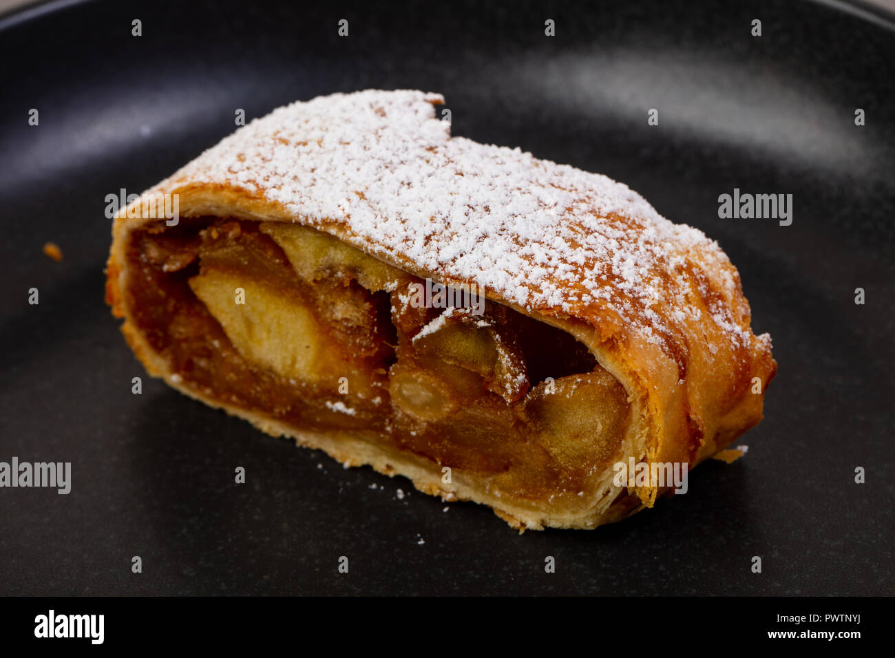 Strudel cake with apple in the bowl Stock Photo - Alamy
