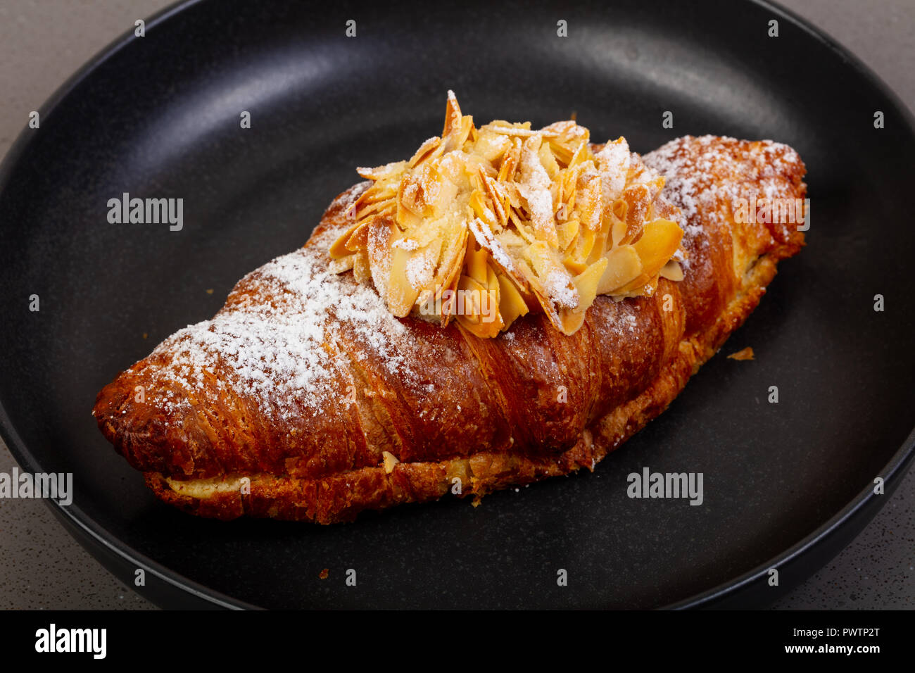 Fresh crust croissant in the plate Stock Photo - Alamy