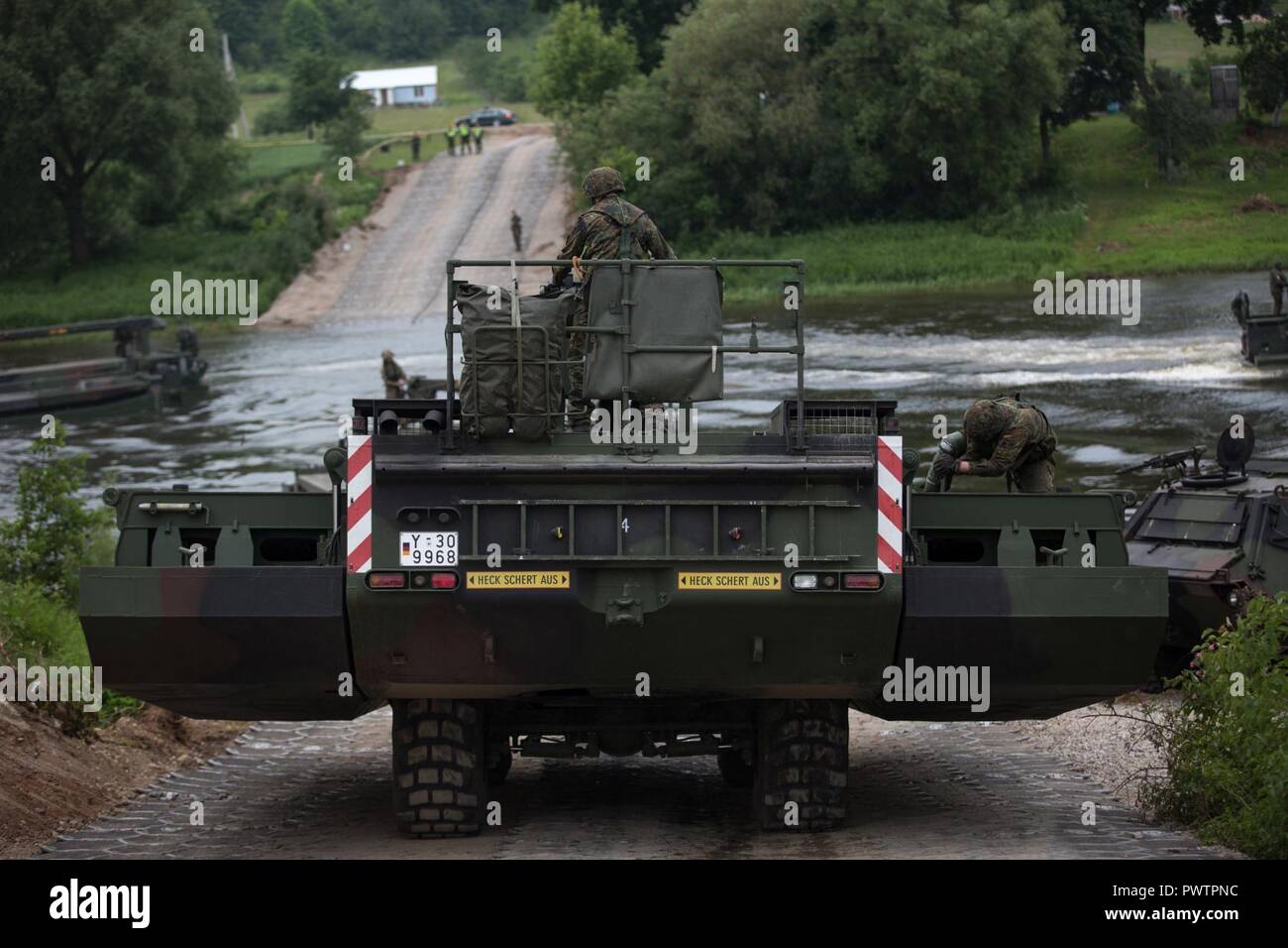 Battle Group Lithuania with German soldiers and British Royal Marines ...