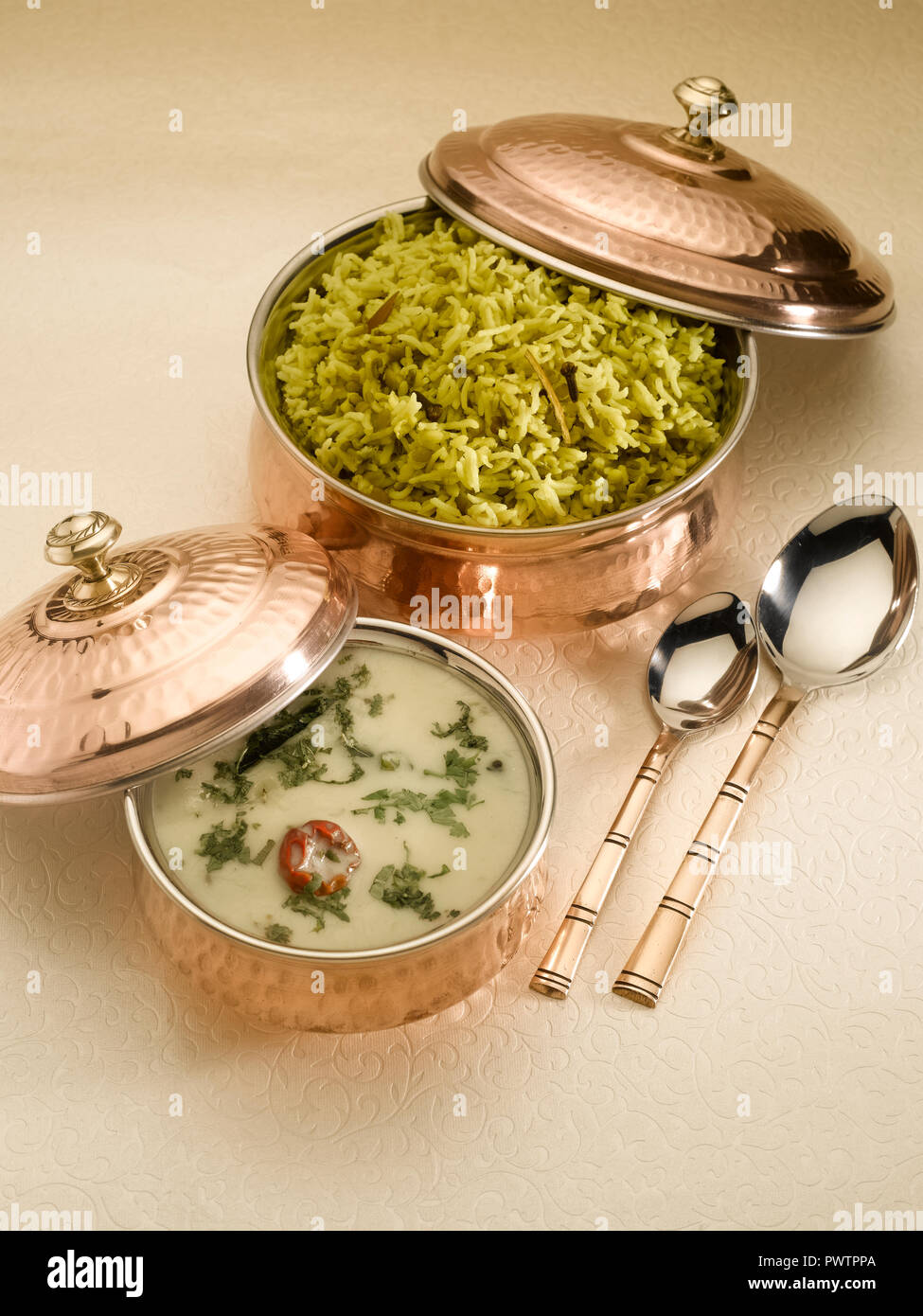 A RICE DISH MADE FROM RICE AND GREEN GRAM /MUNG DAL KHICHDI WITH KADHI ...