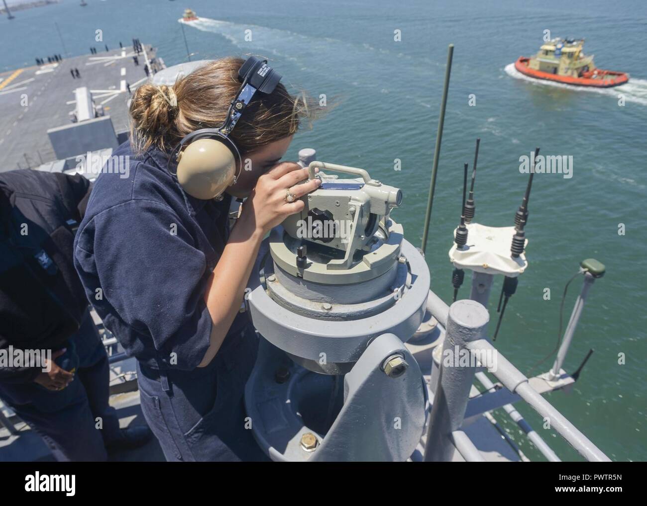 PACIFIC OCEAN (June 19, 2017) Quartermaster Seaman Ali Thibodeaux uses ...
