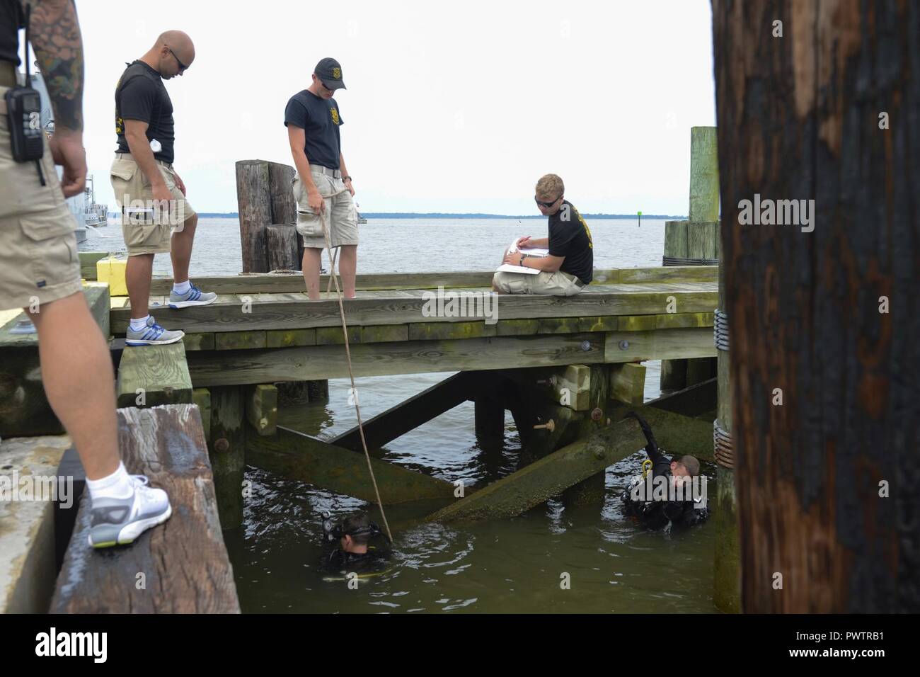 U.S. Army divers assigned to the 74th Engineer Dive Detachment, 92nd ...
