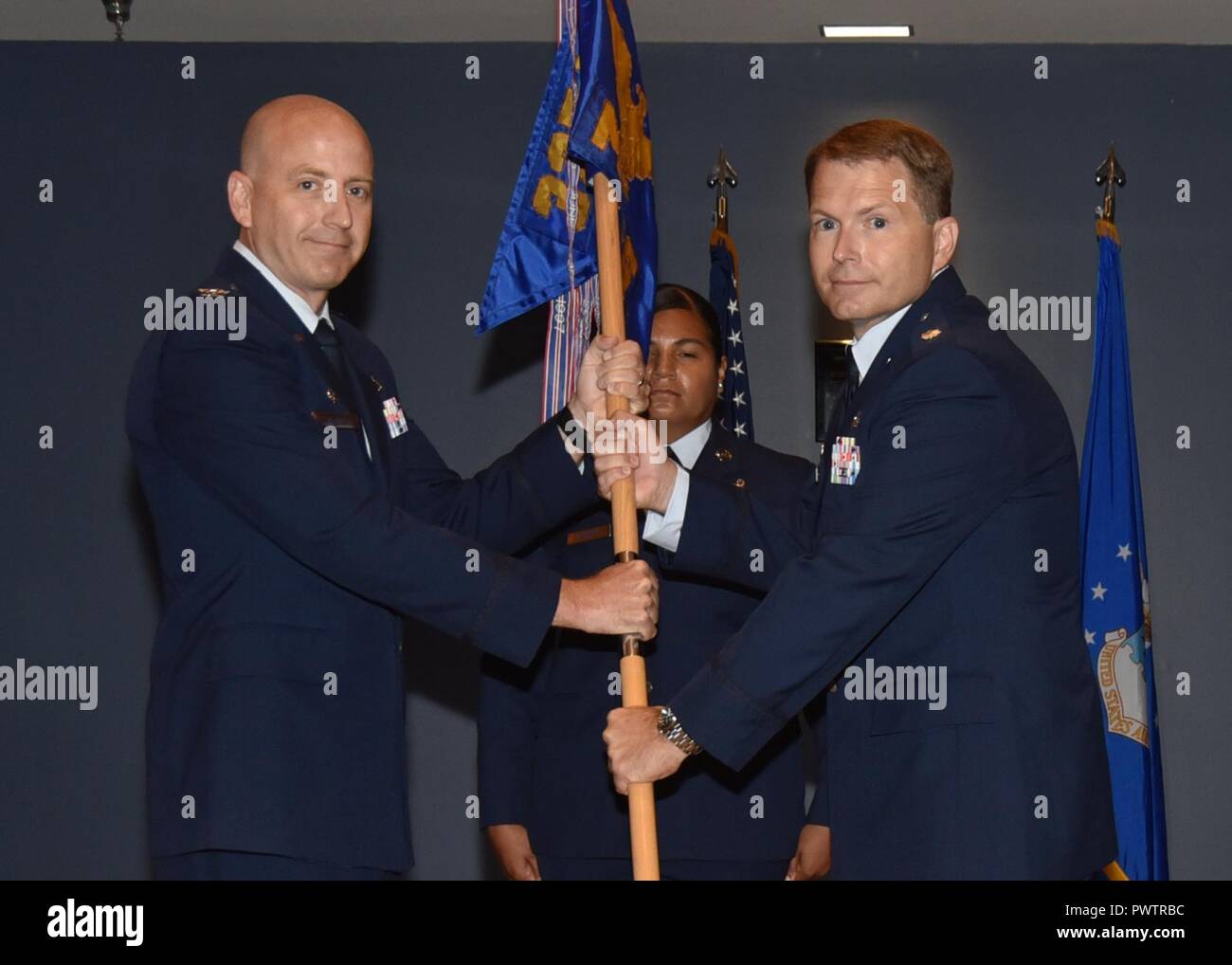 U.S. Air Force Col. Scott McKim, 325th Medical Group commander (left ...