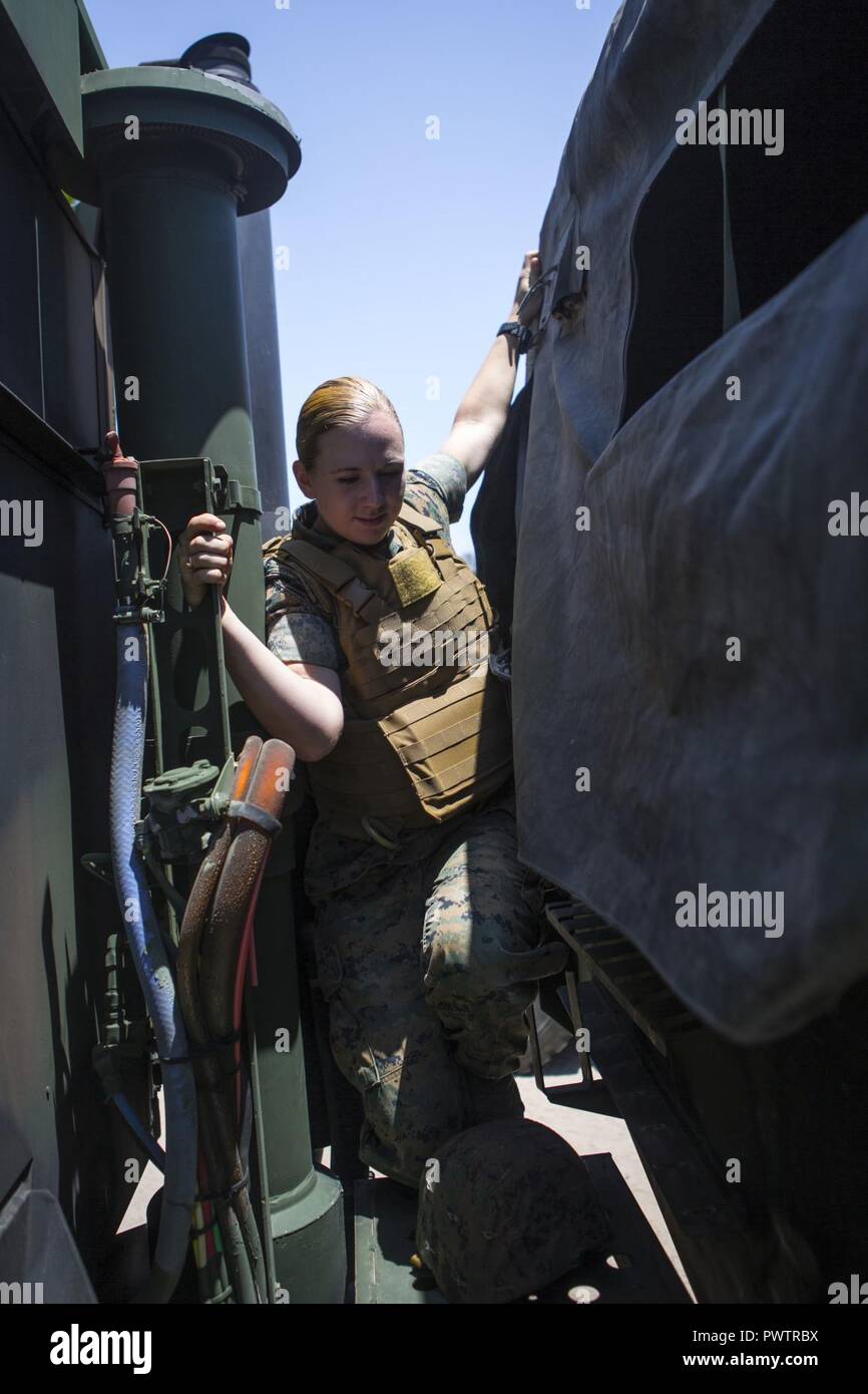 U.S. Marine Pfc. Heather Bartulewicz, a motor transport operator with ...