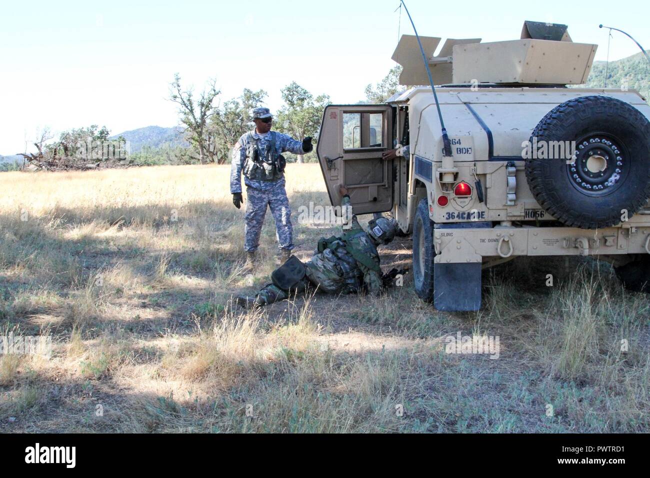 U.S. Army Reserve Capt. Warren Bannister, an Observer-Coach-Trainer ...