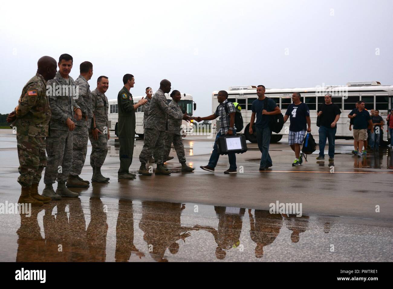 Key leadership from the Florida National Guard greet Airmen from the ...