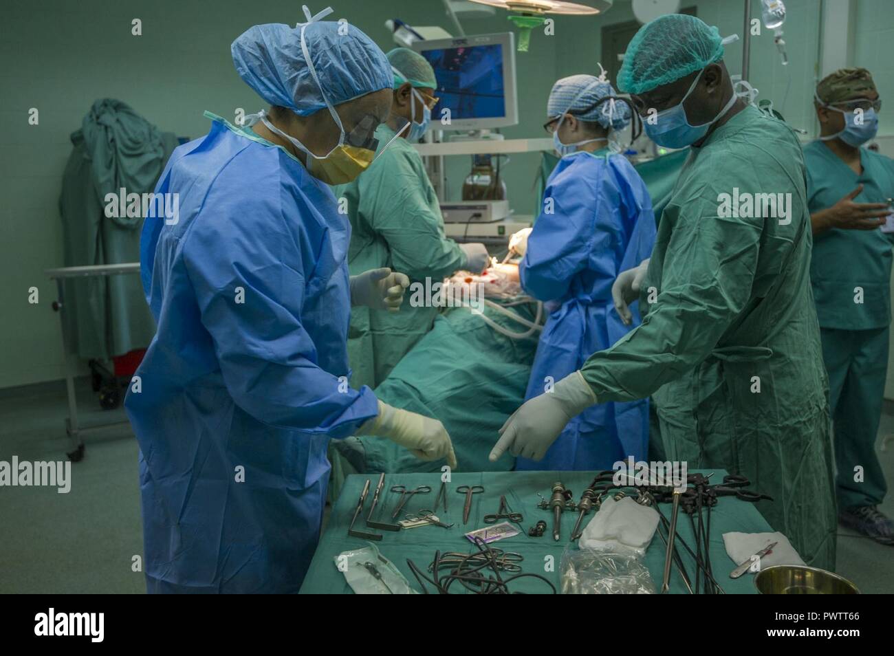 U.S. Army Staff Sgt. Jennifer Singh, an operating room technician ...