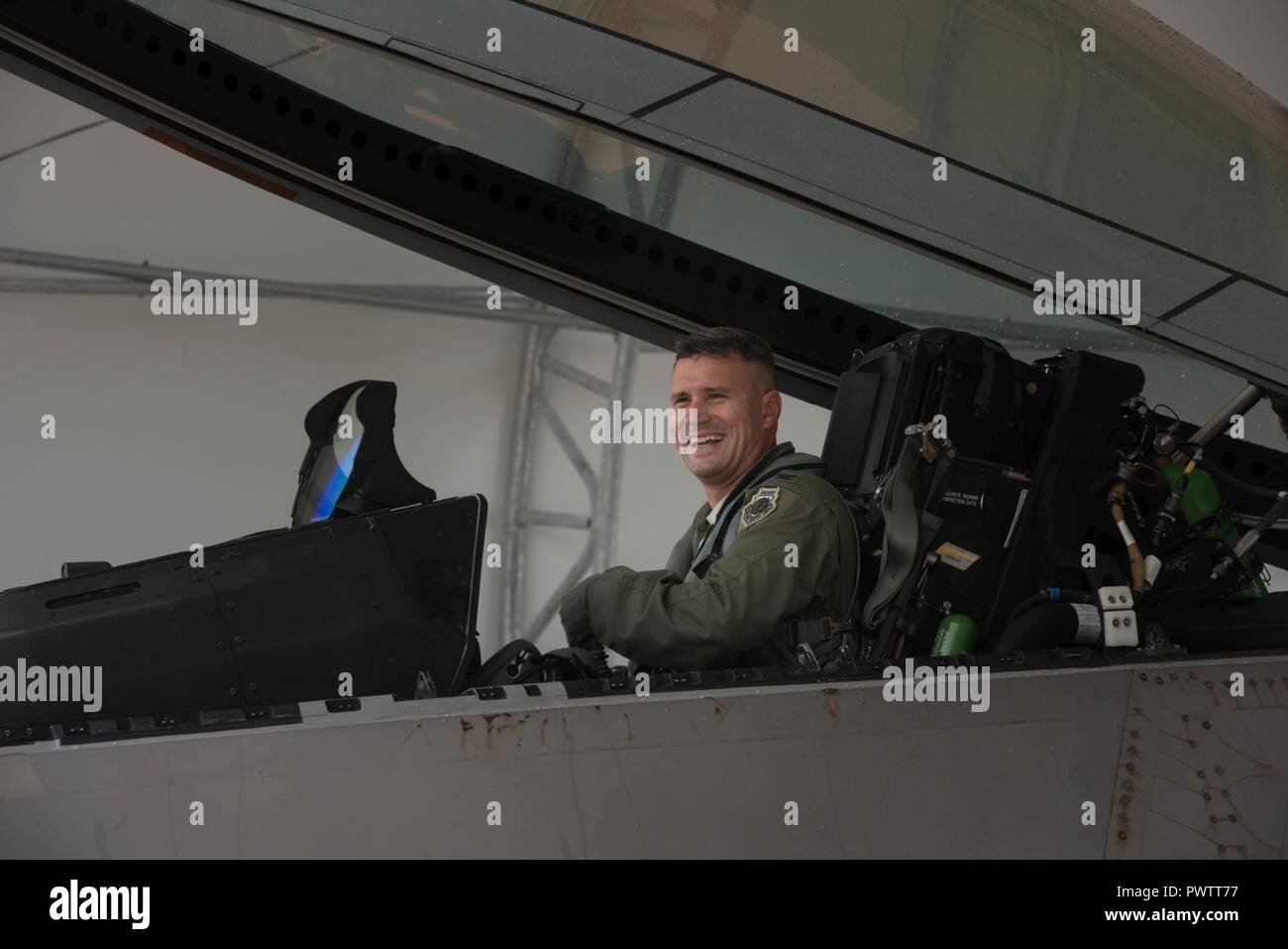 U.S. Air Force Col. Peter Fesler , 1st Fighter Wing commander, smiles ...