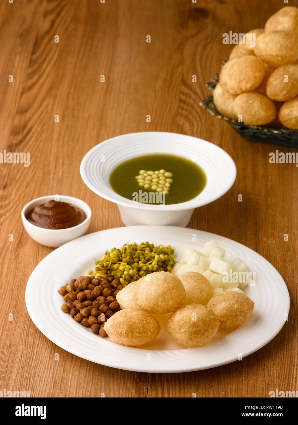 PANI PURI, FRIED BALLS MADE FROM WHEAT SERVED WITH WITH RED CHANNA ...