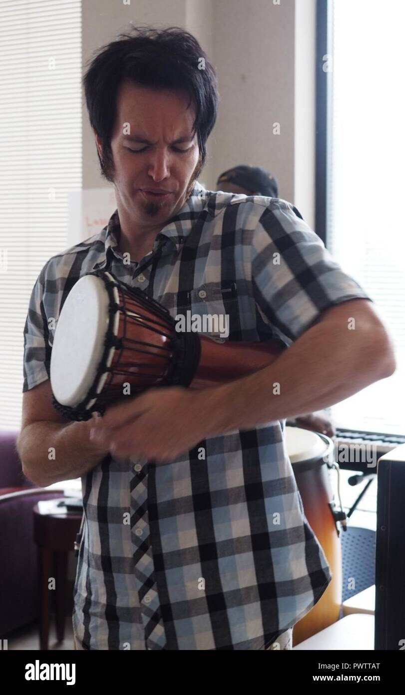 Brian Conner, brother of the late Chris Conner, demonstrates musical ...