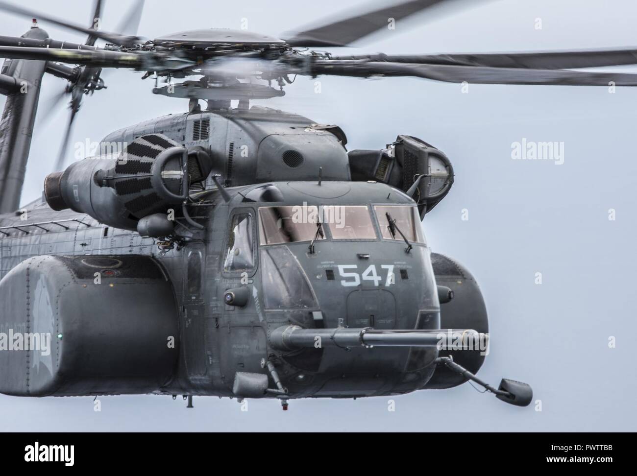 A U.S. Navy MH-53E Sea Dragon assigned to Helicopter Mine ...