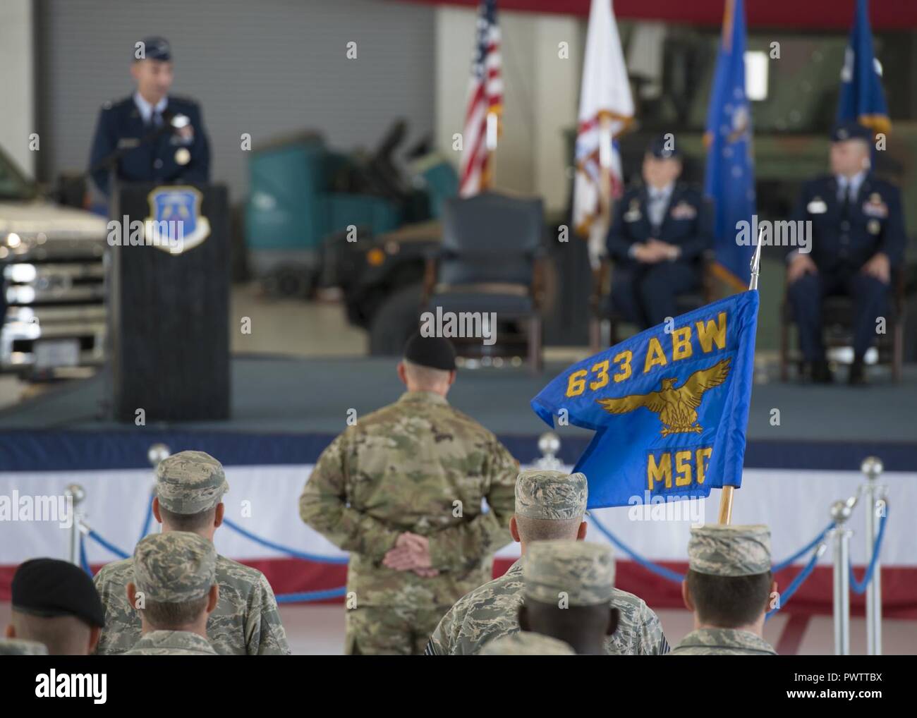 U.S. service members stand in formation during the 633rd Air Base Wing ...