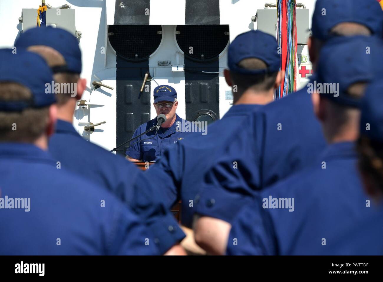 Vice Adm. Fred Midgette, Pacific Area commander, acknowledges the ...