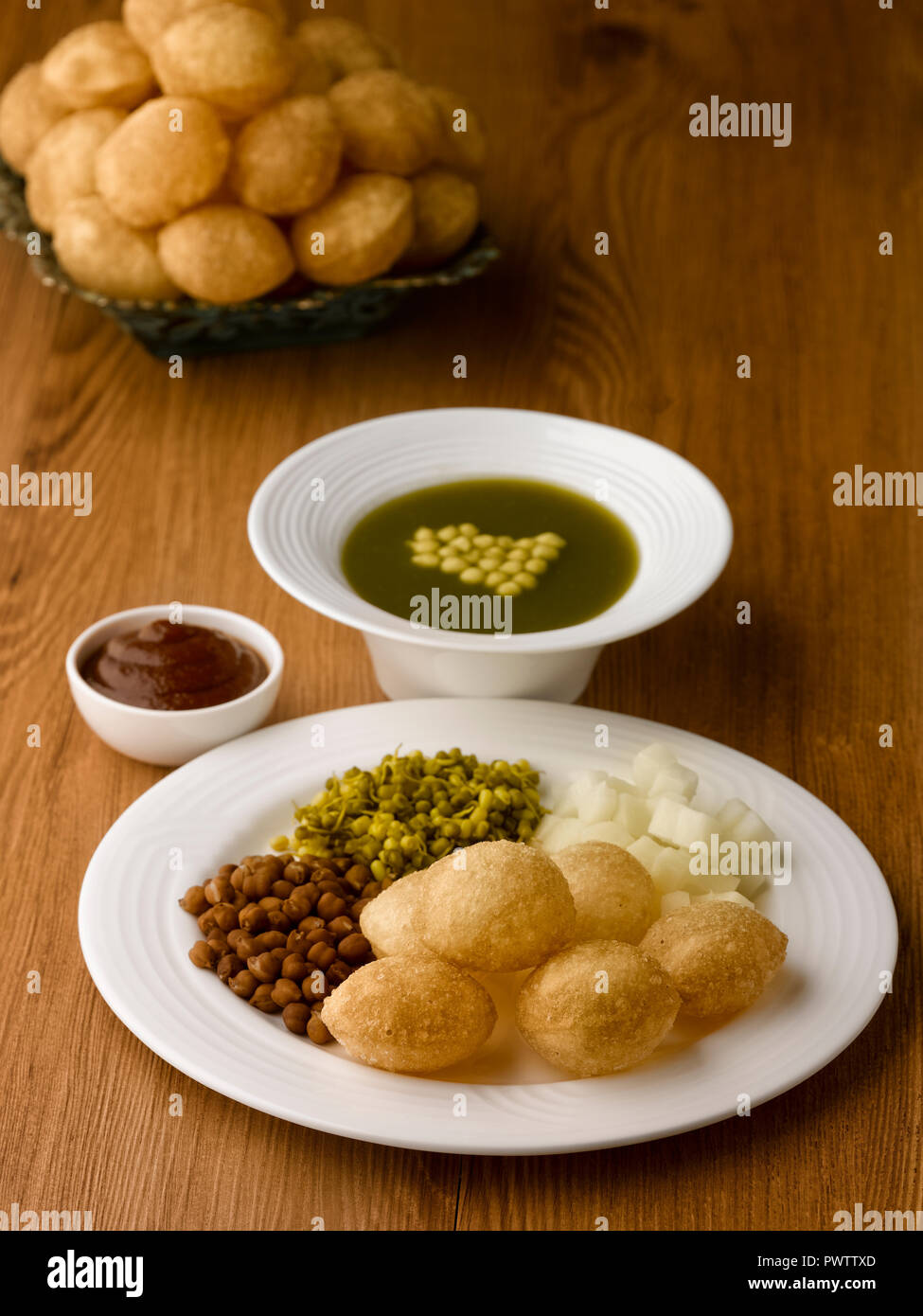 PANI PURI, FRIED BALLS MADE FROM WHEAT SERVED WITH WITH RED CHANNA ...