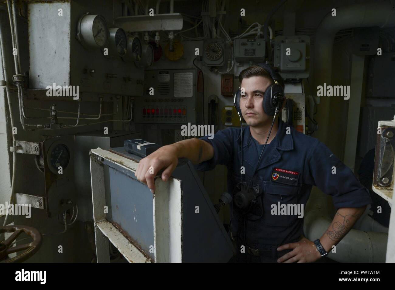 PACIFIC OCEAN (June 21, 2017) Seaman Jacob Linton mans a sound powered ...