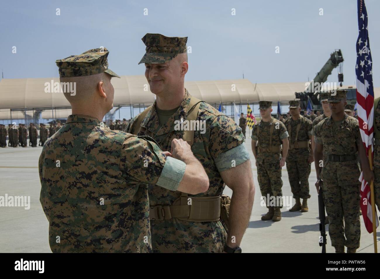 U.S. Marine Corps Maj. Gen. Russell A. Sanborn, left, the commanding general of 1st Marine ...
