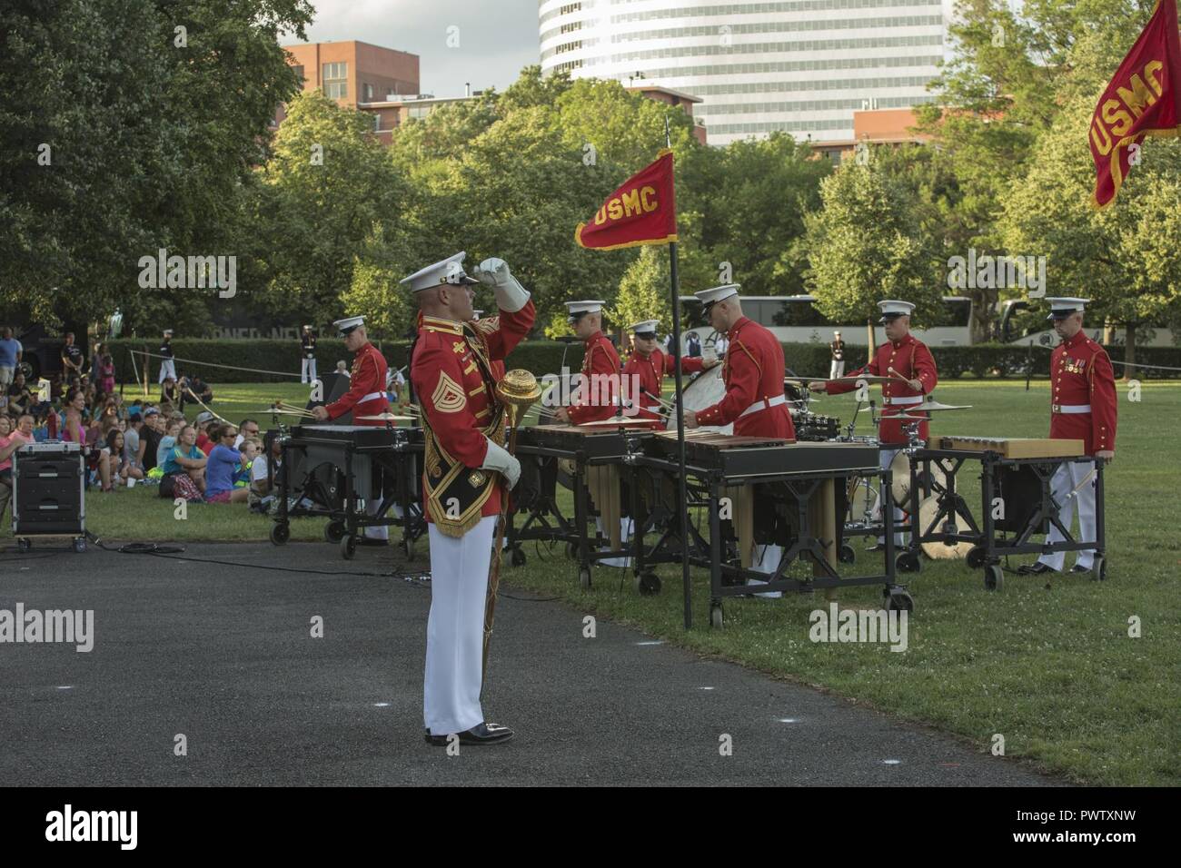 The U.S. Marine Drum and Bugle Corps perform during a sunset parade at ...