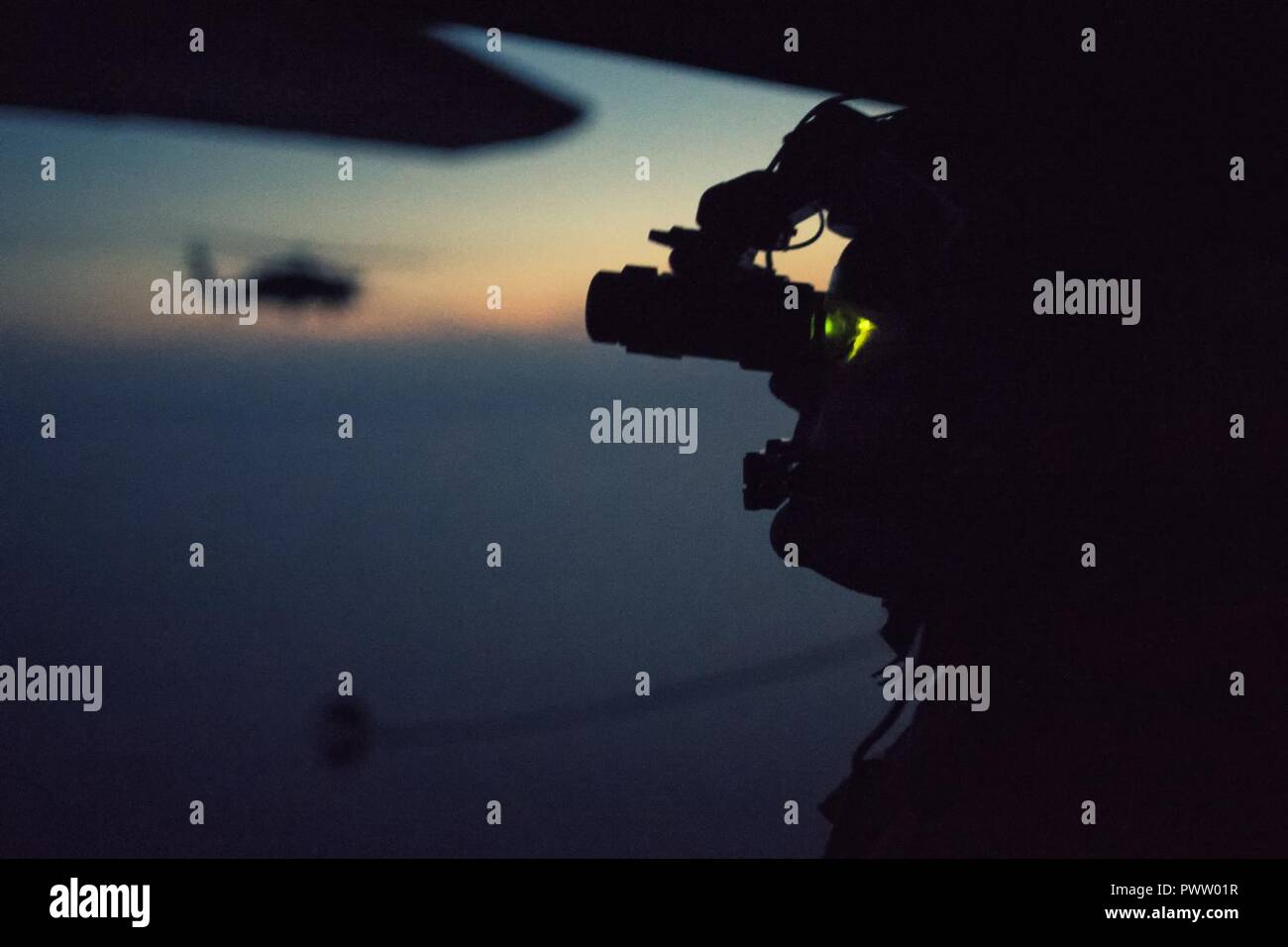 A U.S. Air Force loadmaster from the 353rd Special Operations Group ...